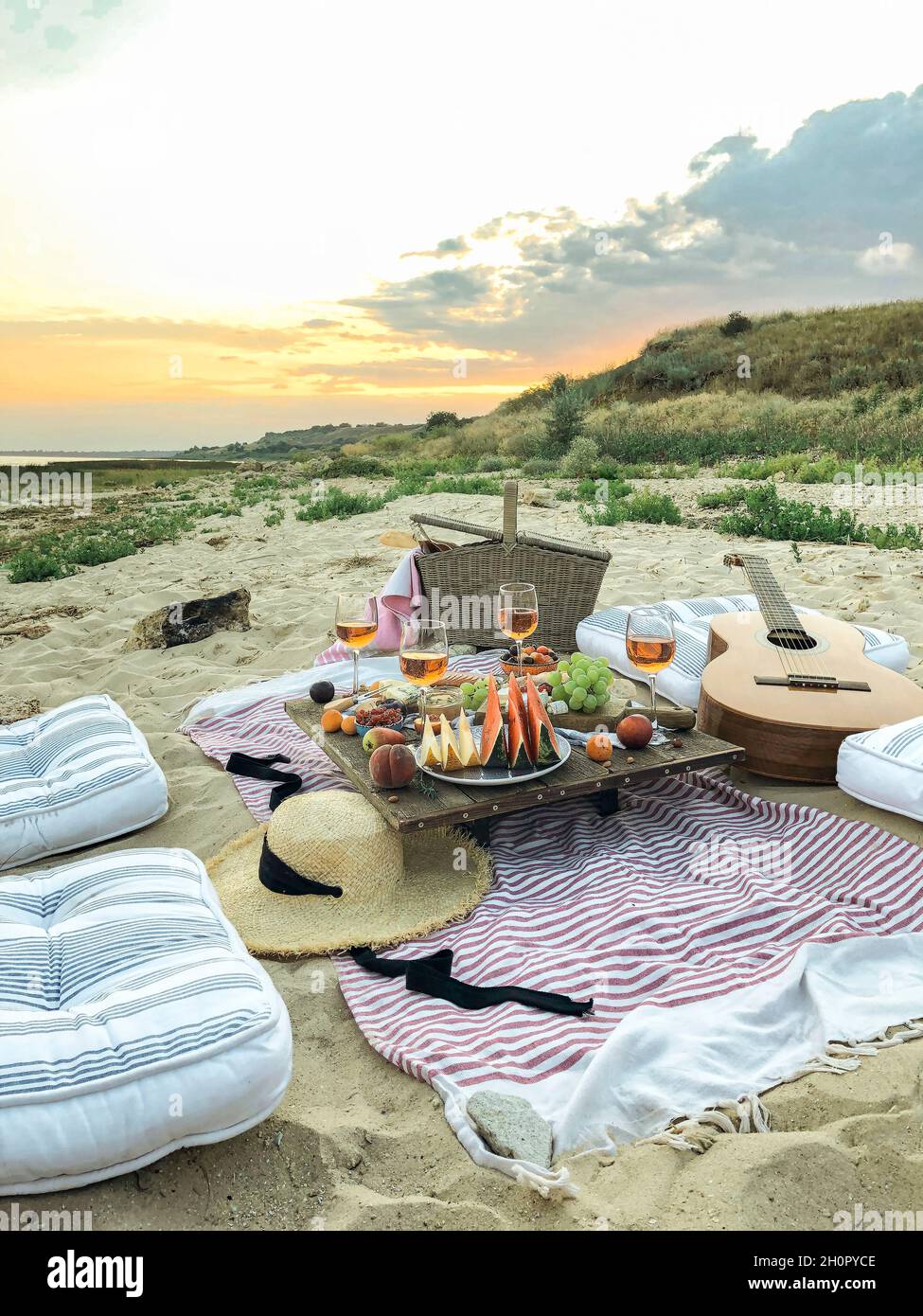 Various tasty food and drinks placed on wooden table during summer ...