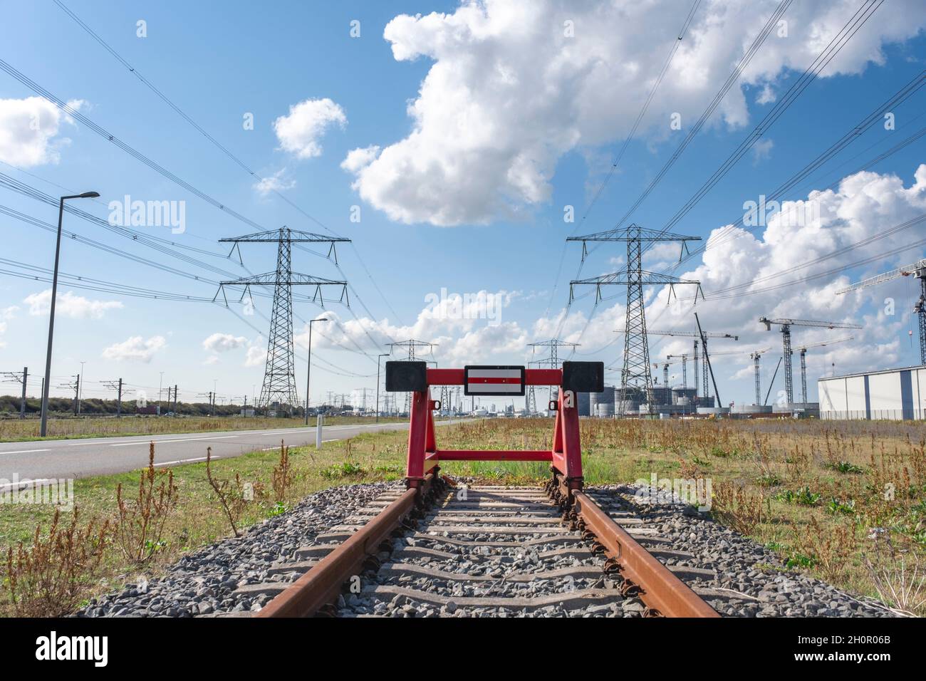 wooden buffer stop with red stop sign ending rail tracks concept for ...