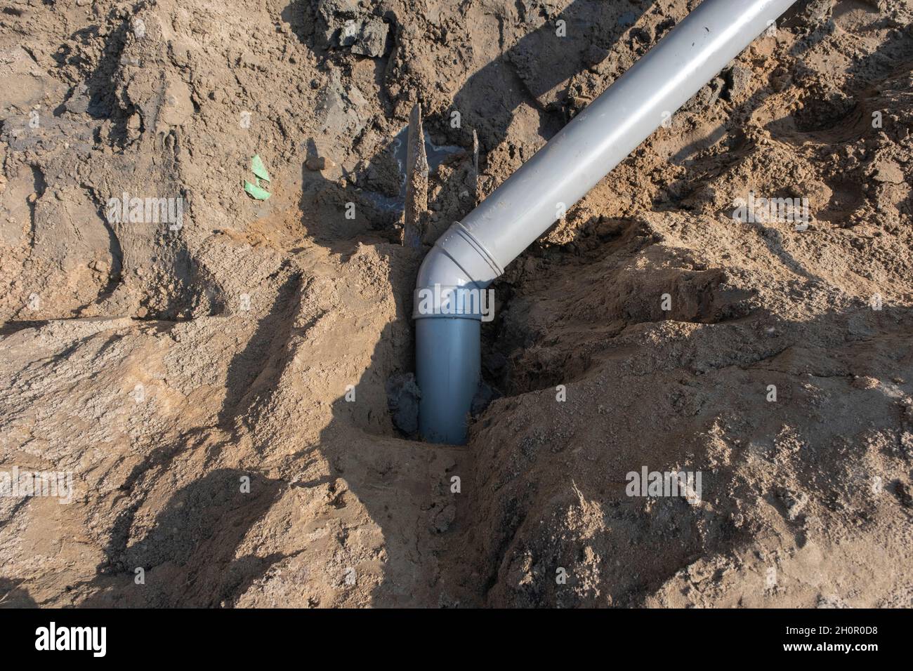 Plastic pipes in the ground during the construction of a building ...