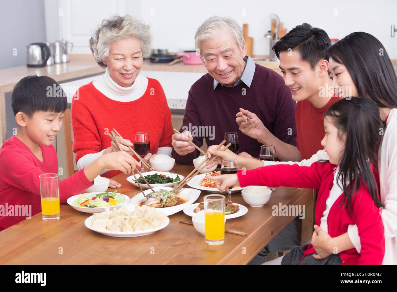 Two boys holding two fish hi-res stock photography and images - Alamy