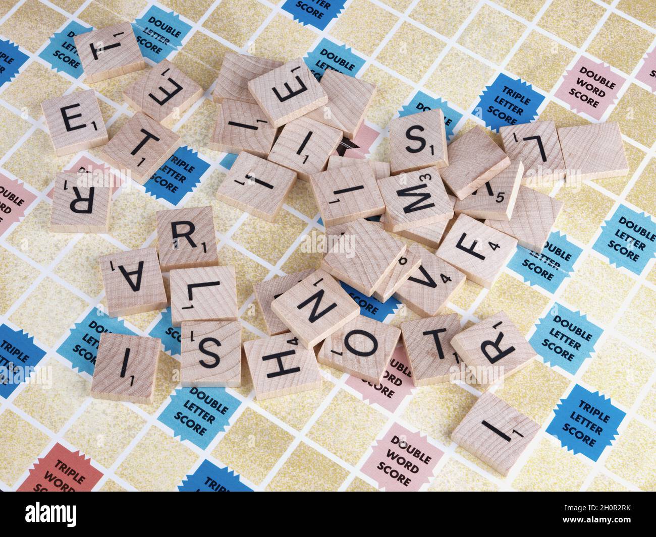 Wood letters on board game Stock Photo - Alamy