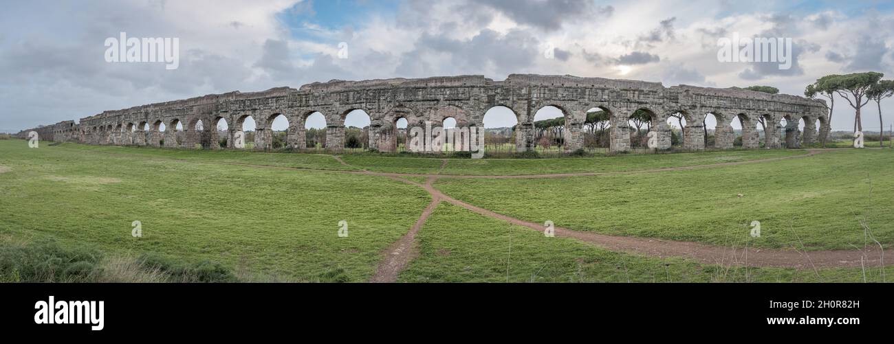 Ruins and arches of the Aqua Claudia aqueduct, a waterbridge from the ...
