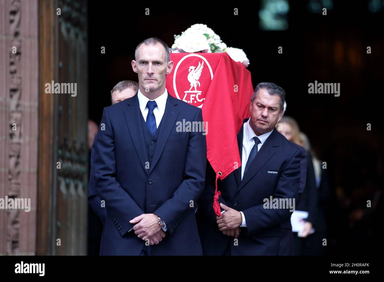 The coffin of Roger Hunt is led out of Liverpool Cathedral after the ...