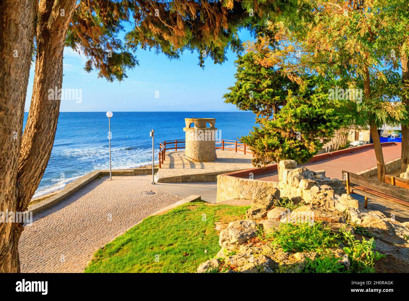 Seaside cityscape - view of the embankment with stone tower in the Old ...
