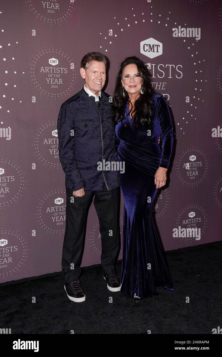 Randy Travis, Mary Davis attends the 2021 CMT Artist of the Year on ...