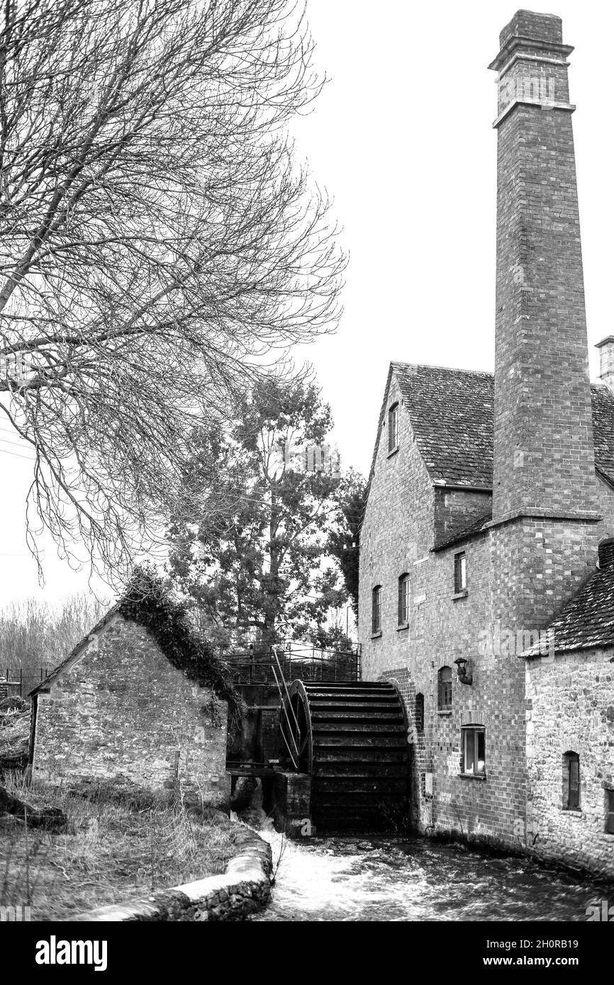 Grayscale of an old mill in the Cotswolds village, England Stock Photo ...