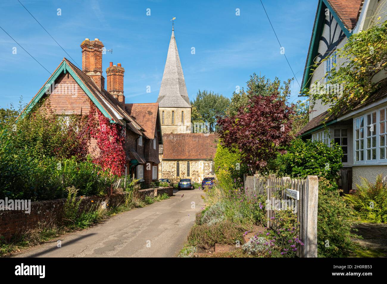 St James's Church and cottages in Shere, a pretty village in Surrey ...