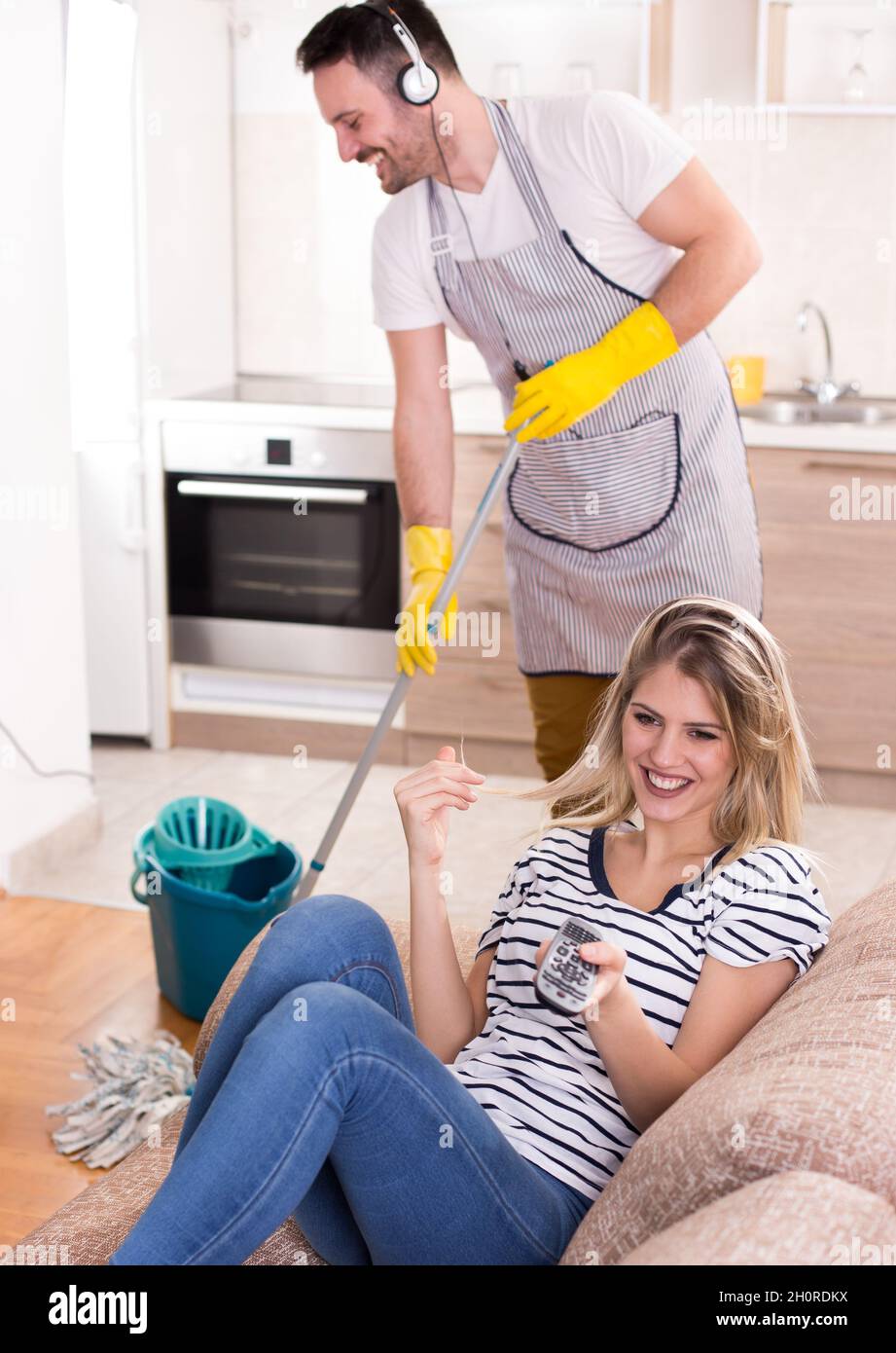 Husband doing housework hi-res stock photography and images - Alamy