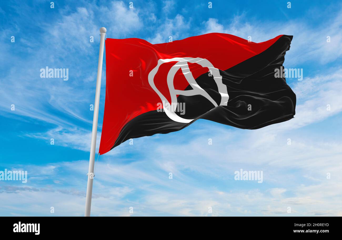 flag of Anarchist with A symbol at cloudy sky background on sunset ...