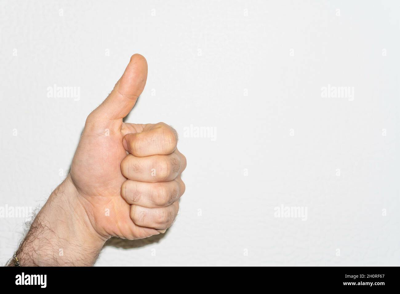 Hand showing like gesture Stock Photo - Alamy
