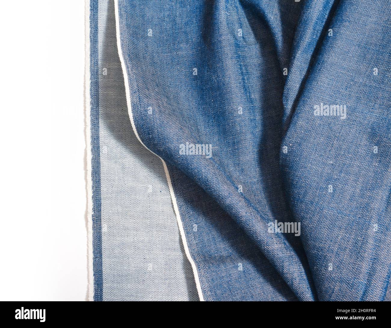 Denim blue jeans texture. Legs jeans textile. Folds fabric on white ...