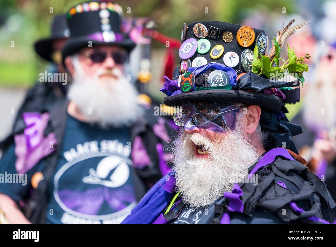 Face of mature man with full white beard, wearing spectacles and black ...