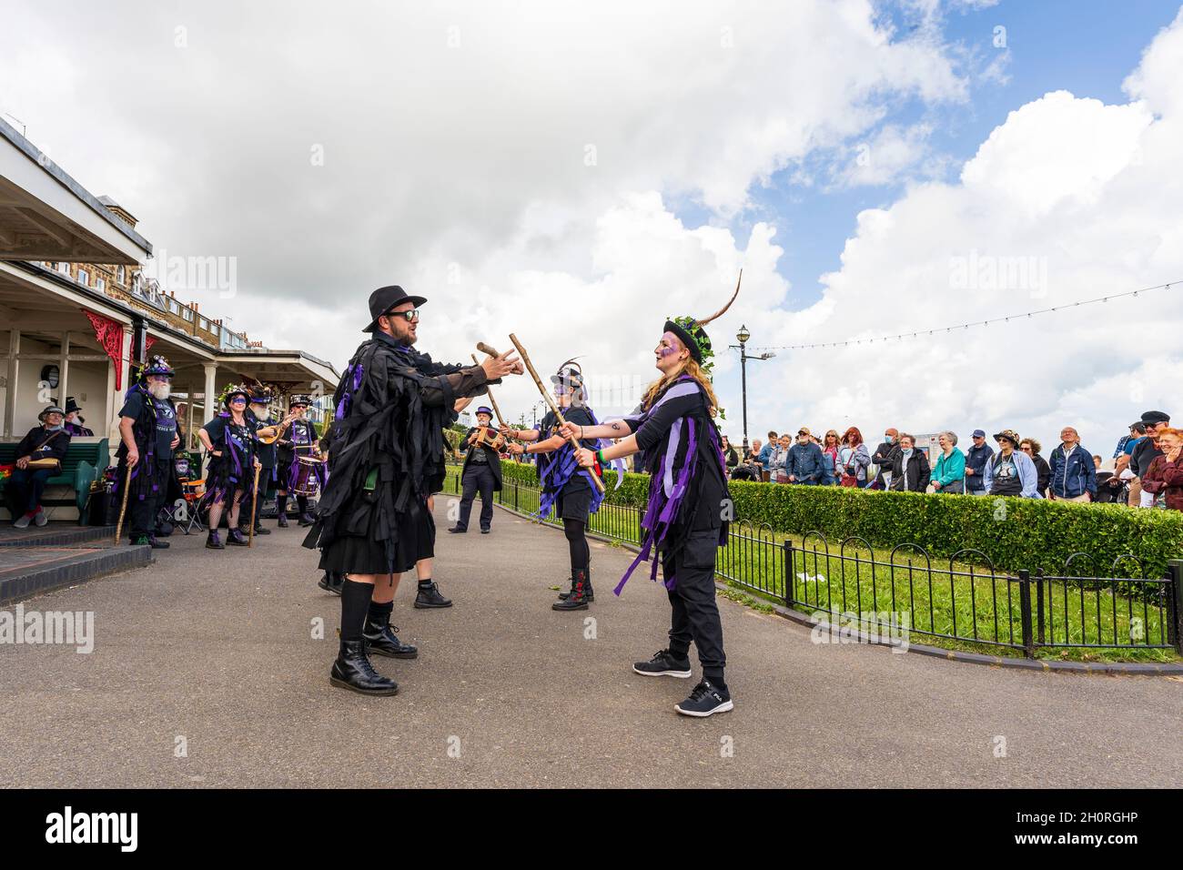 Black Swan Border Morris dancers in their black and mauve costume ...