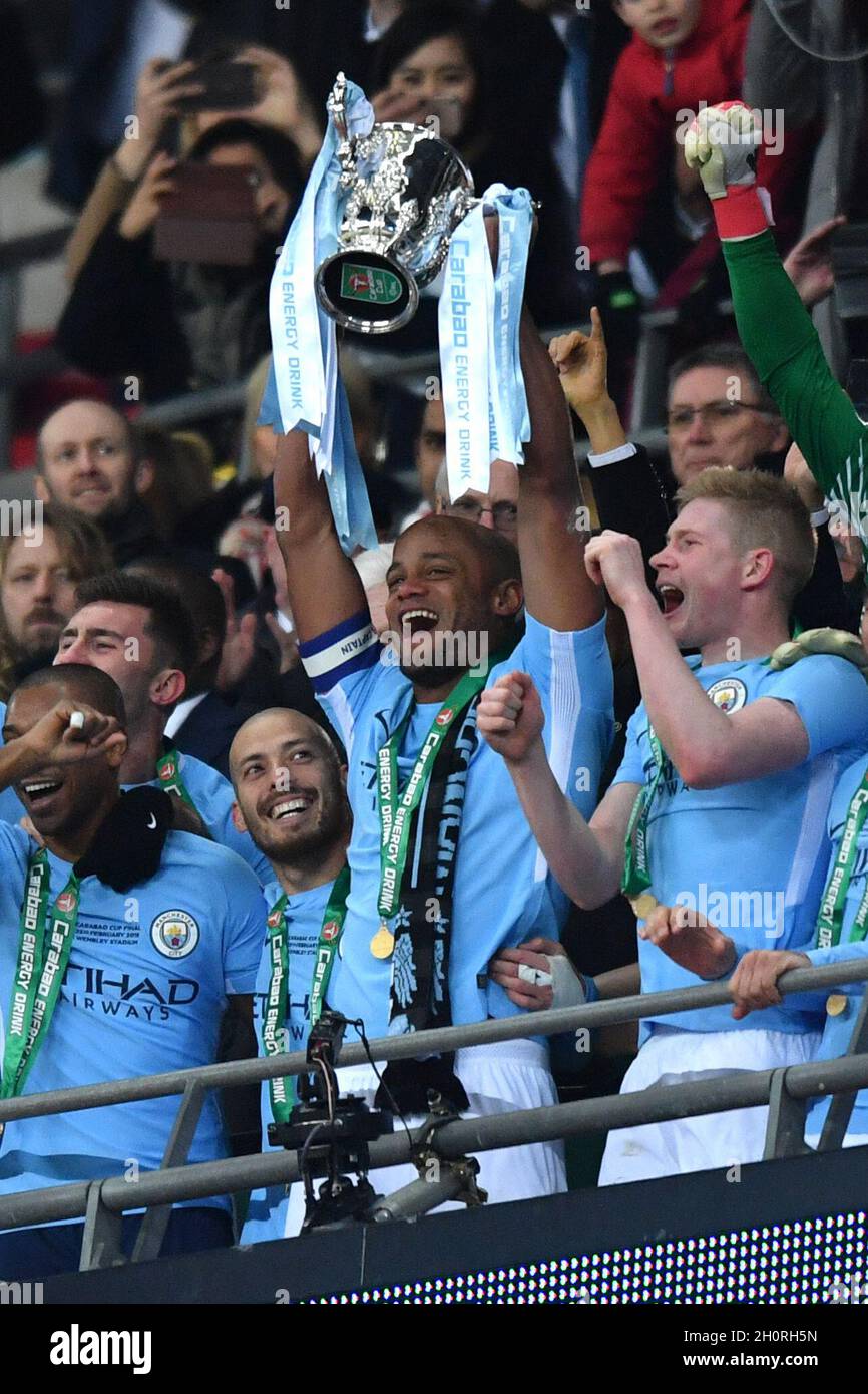 Manchester City’s Vincent Kompany lifts the trophy Stock Photo - Alamy