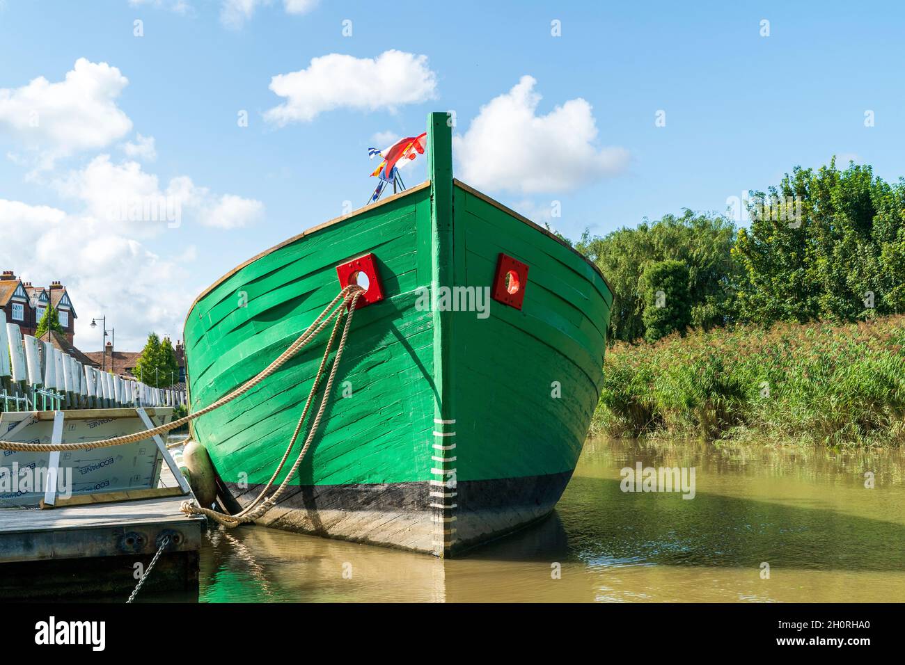 Low angel view of re constructed medieval wooden cog boat on river at ...