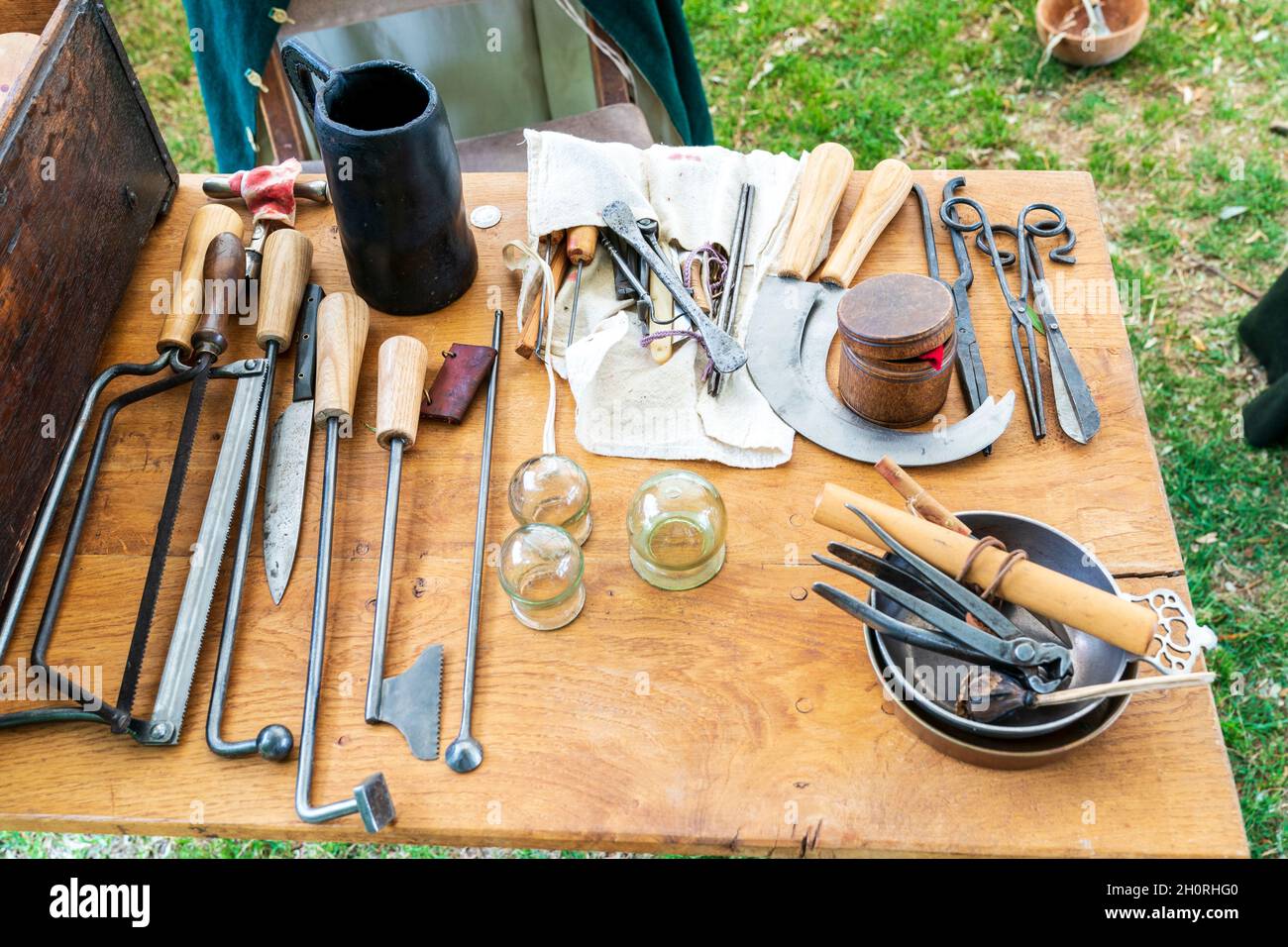 Medieval living history display. Barber surgeons tools, including ...