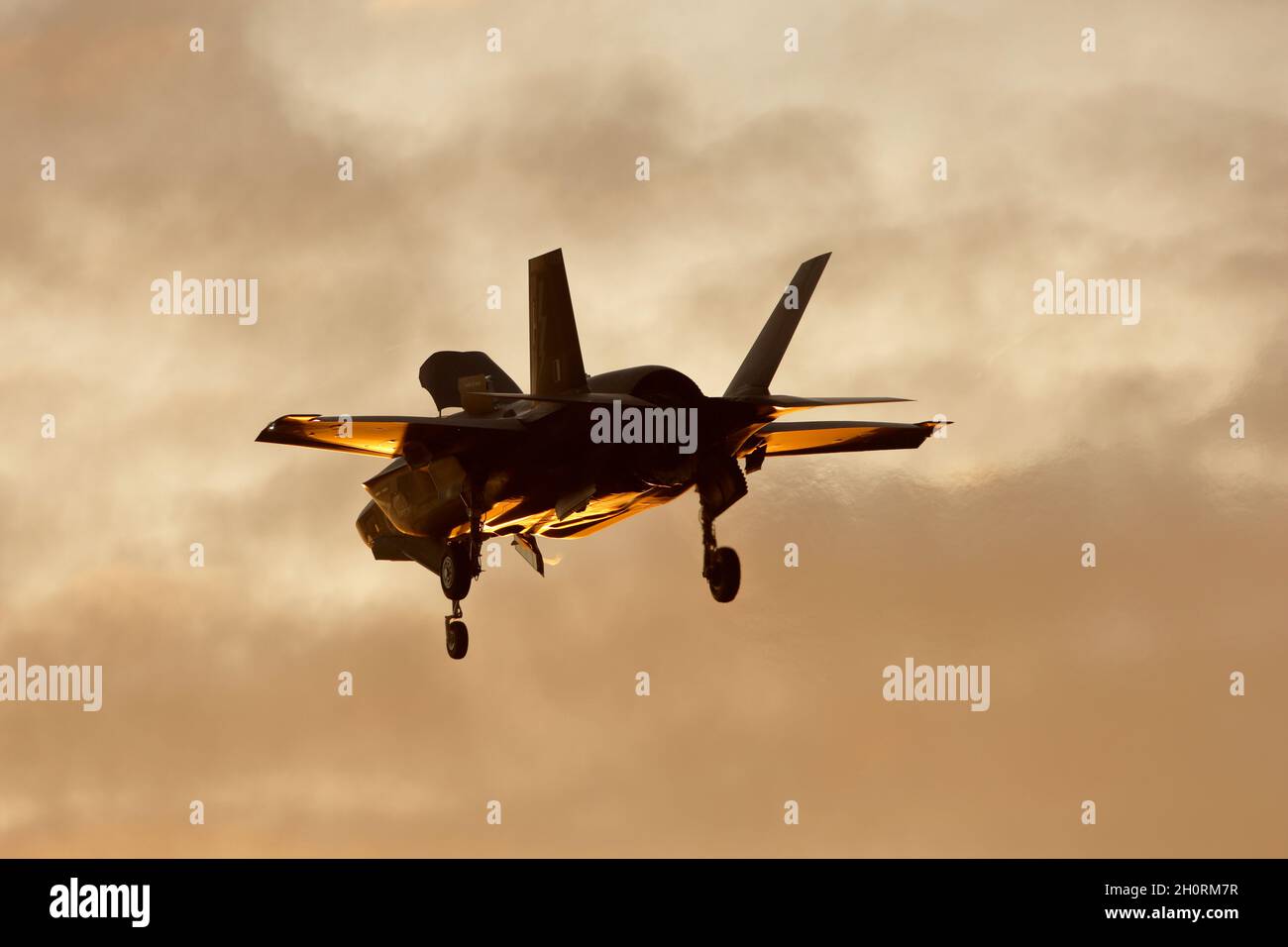 Lockheed Martin F-35B Lightning II hovering at sunset, at RAF Marham in ...