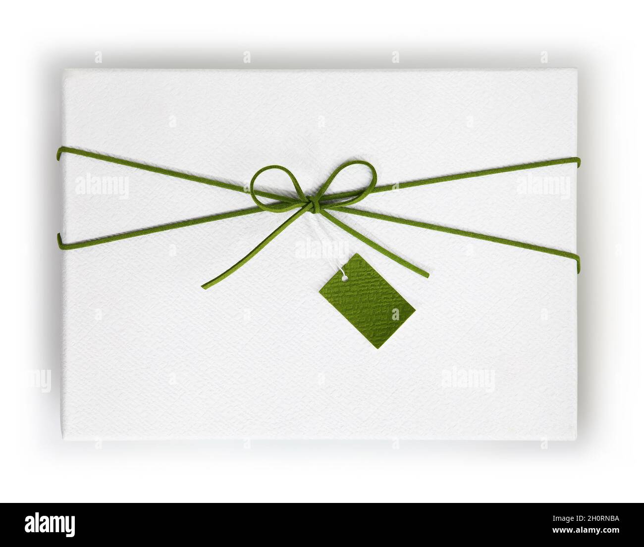 white color gift box with green string ribbon bow and gift card label ...