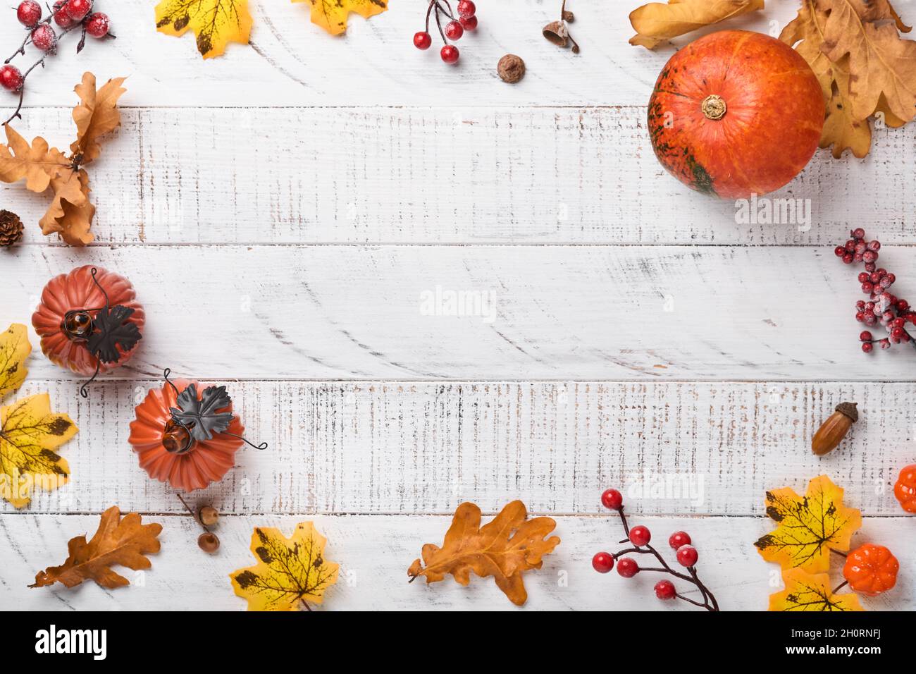 Pumpkin. Autumn food background with cinnamon, nuts and seasonal spices ...