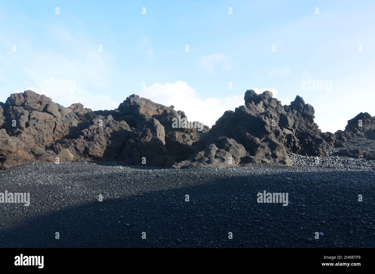 Large black lava rock formation on Dritvik Beach in Iceland Stock Photo ...