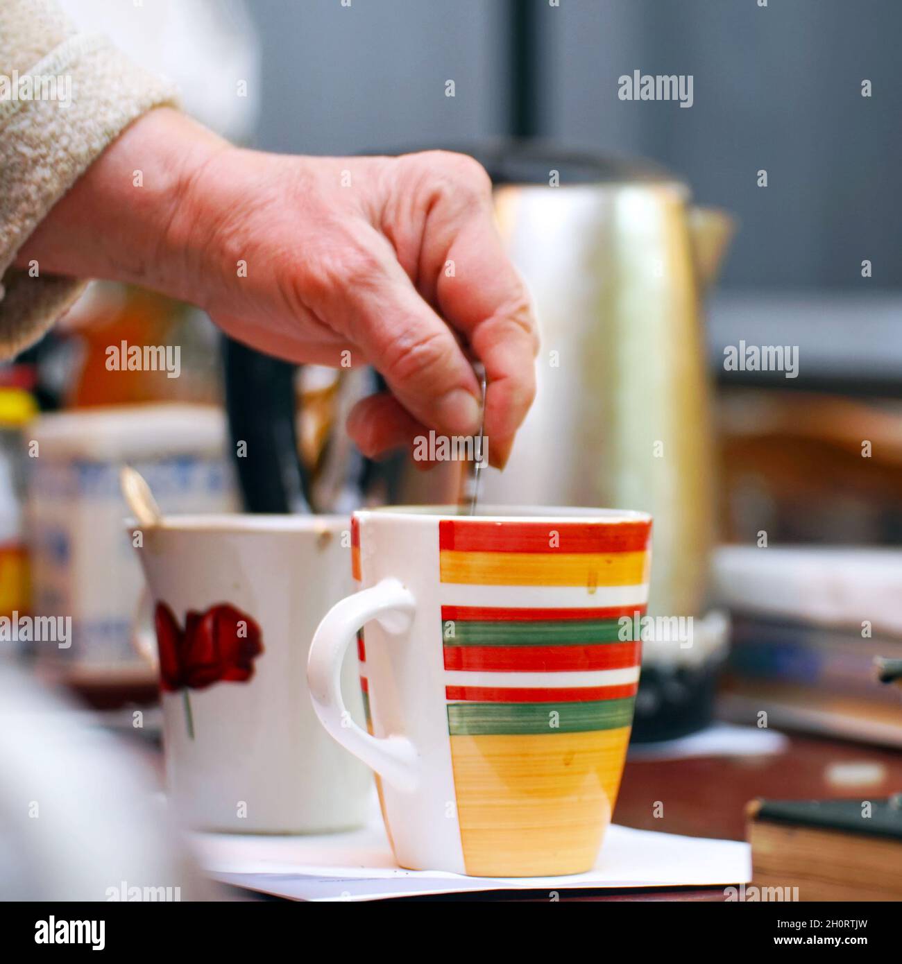 Woman stirs instant coffee hi-res stock photography and images - Alamy