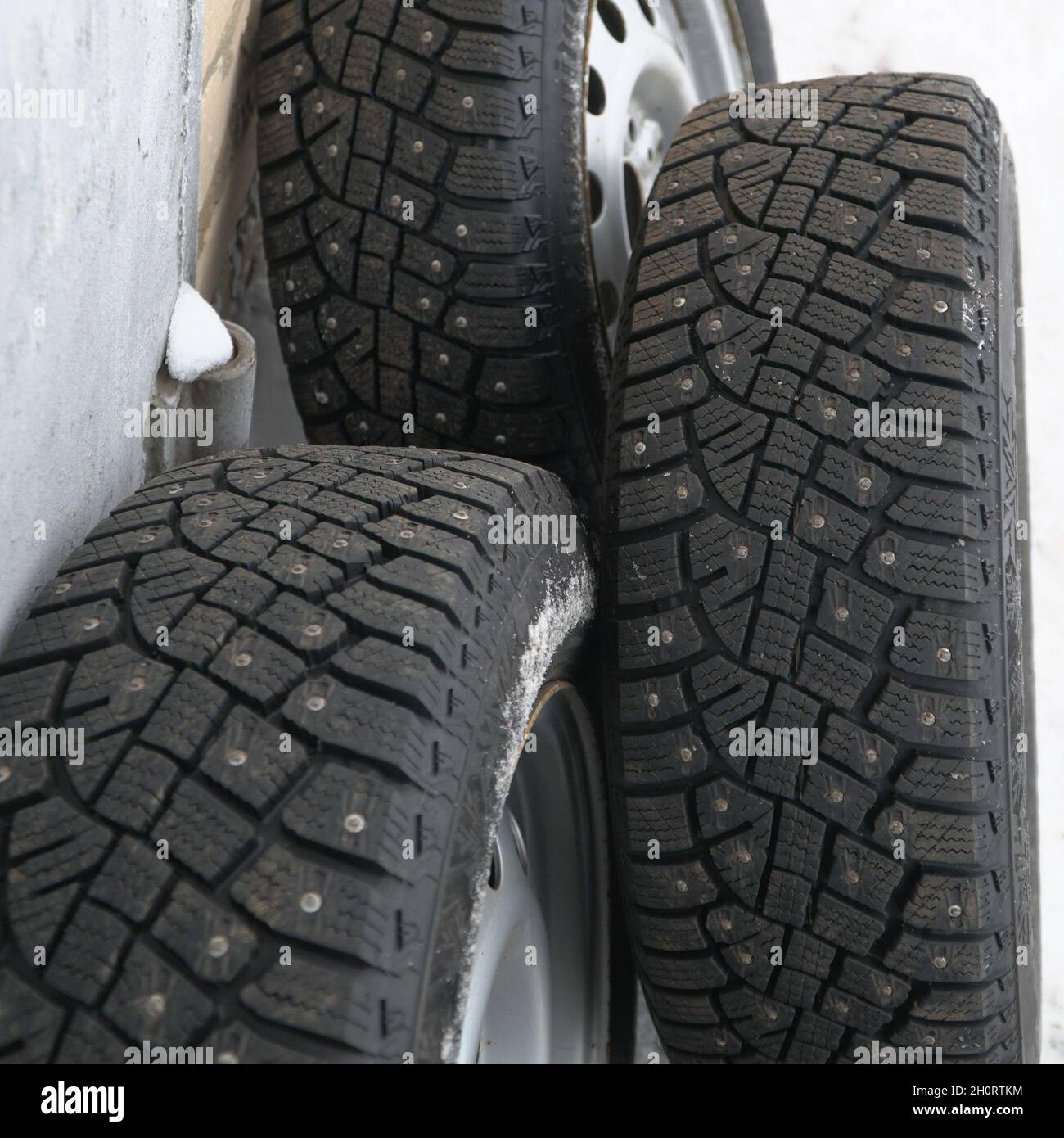 Winter studded tires for safe driving Stock Photo - Alamy