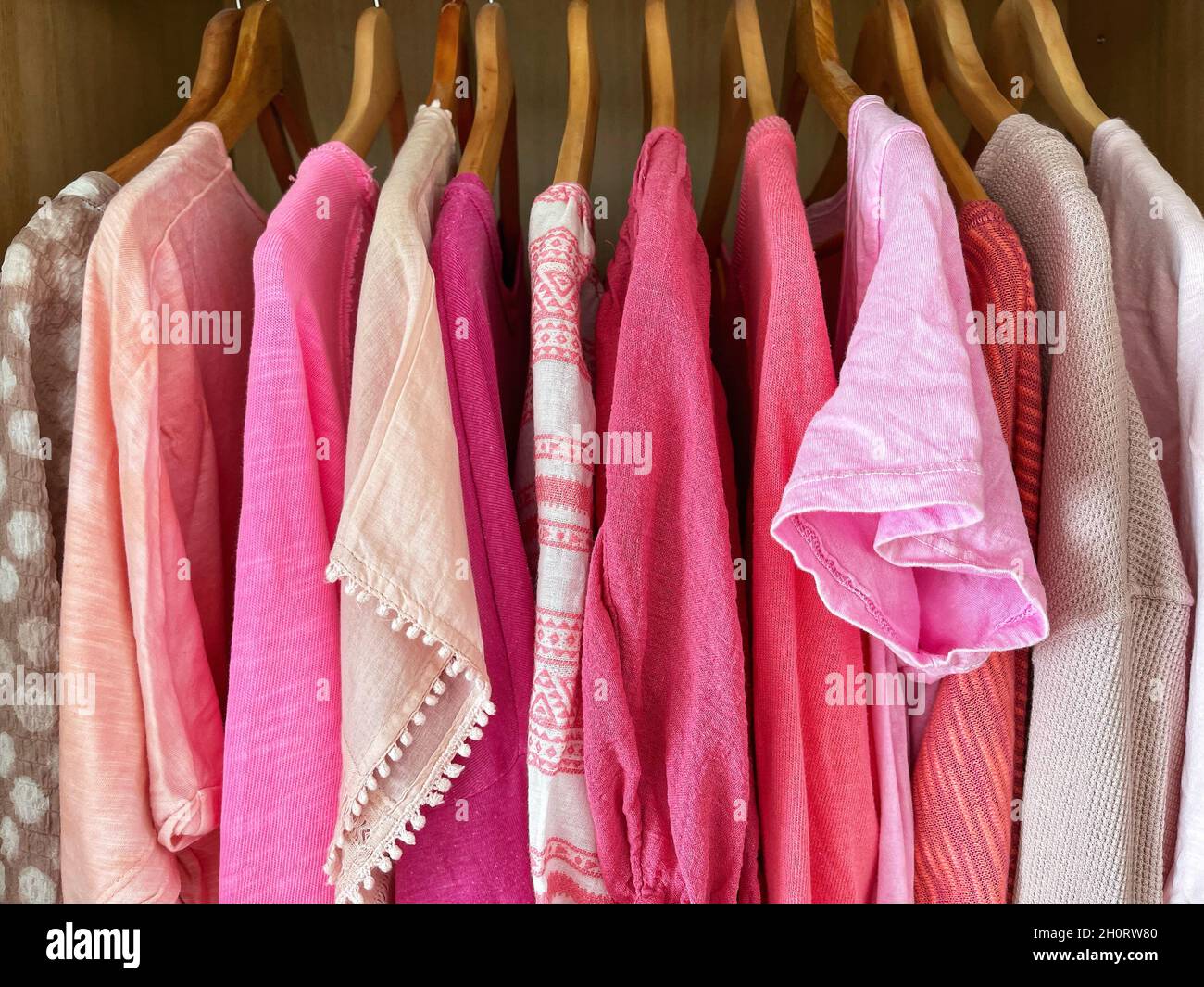 Hanging blouses tops hi-res stock photography and images - Alamy