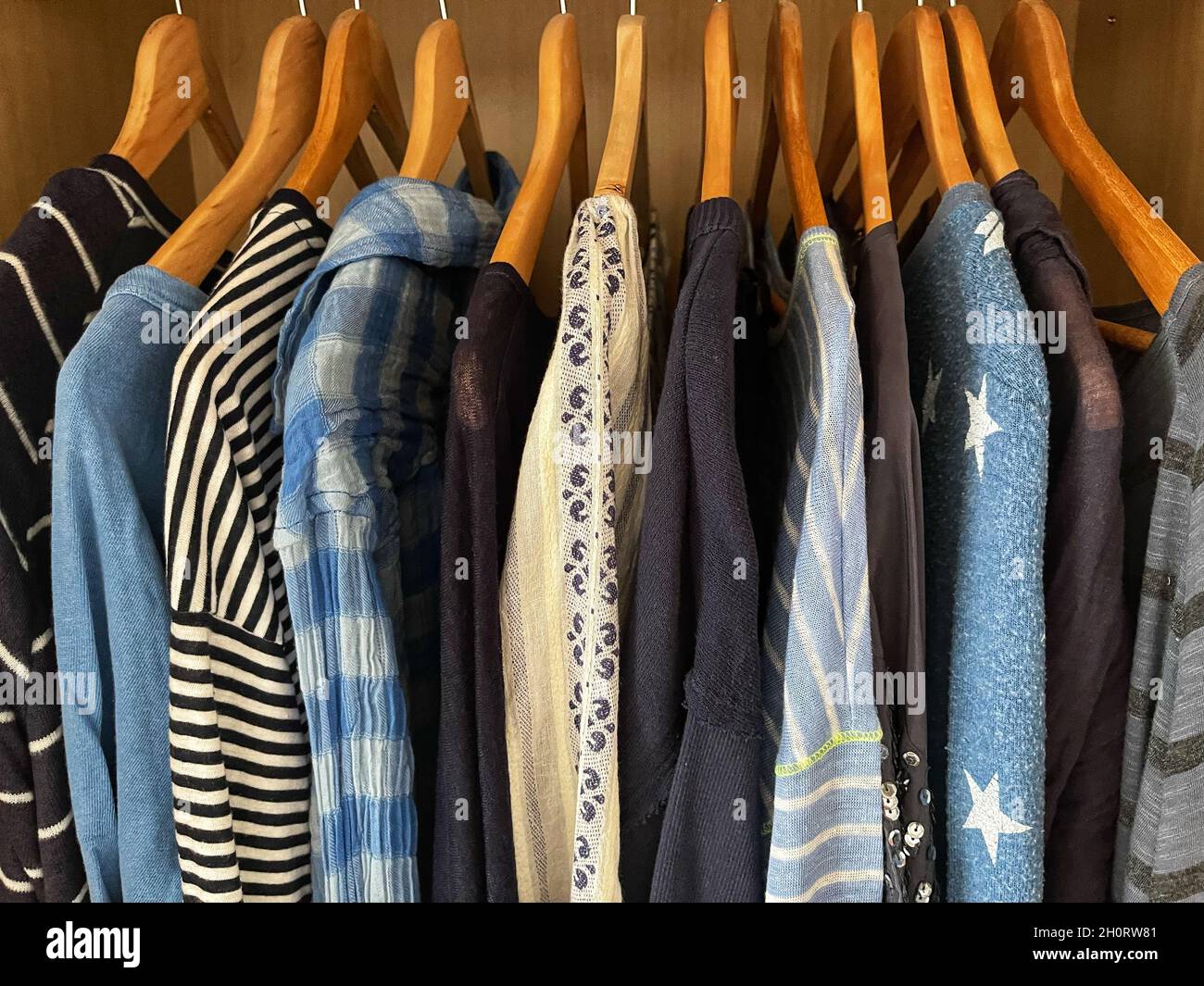 Hanging blouses tops hi-res stock photography and images - Alamy
