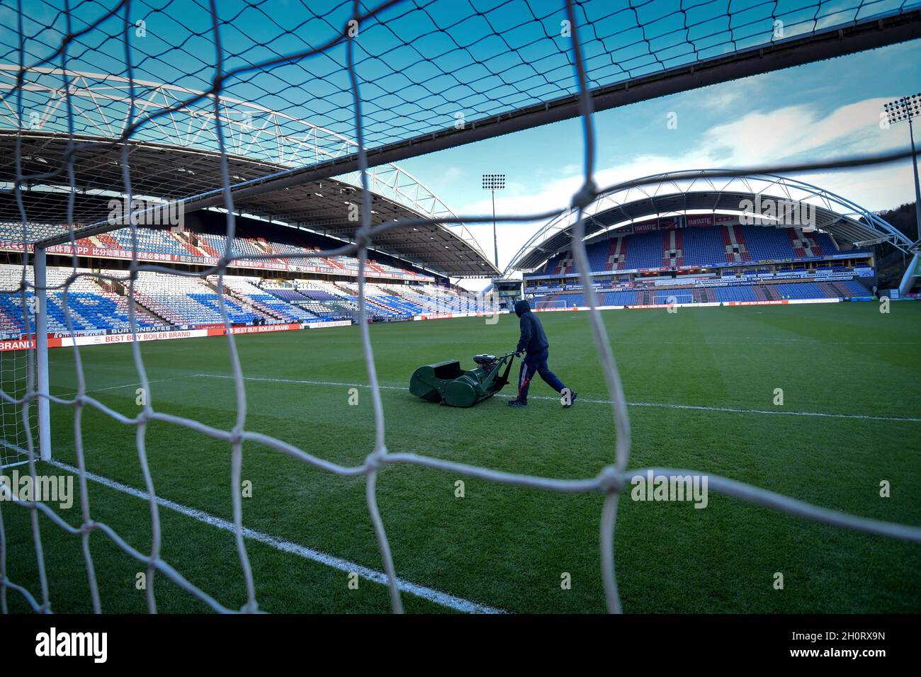 Ground staff prepare the pitch ahead of kick-off Stock Photo - Alamy