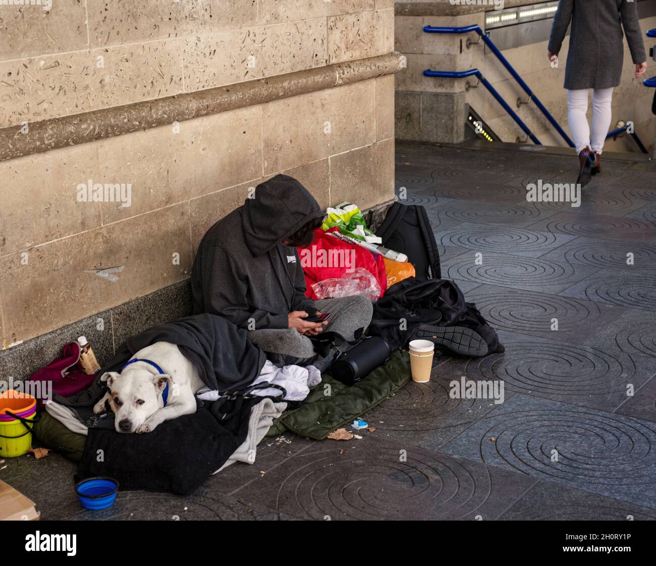 Homeless man sleeping on the pavement near Green Park Underground ...
