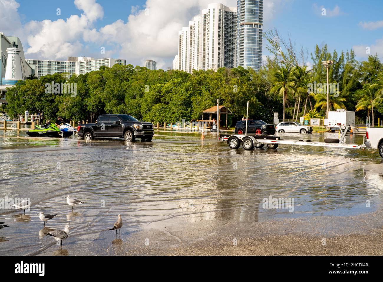 Miami Beach, FL, USA - October 13, 2021: Trucks unloading boats at ...