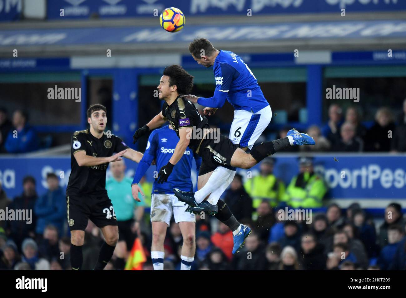 Leicester City's Shinji Okazaki and Everton's Phil Jagielka compete for ...
