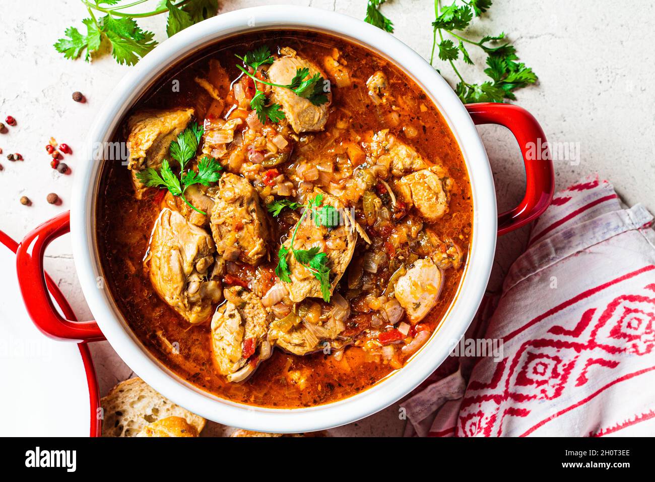 Chicken stew with tomato sauce - Chahohbili in pot, top view. Georgian ...