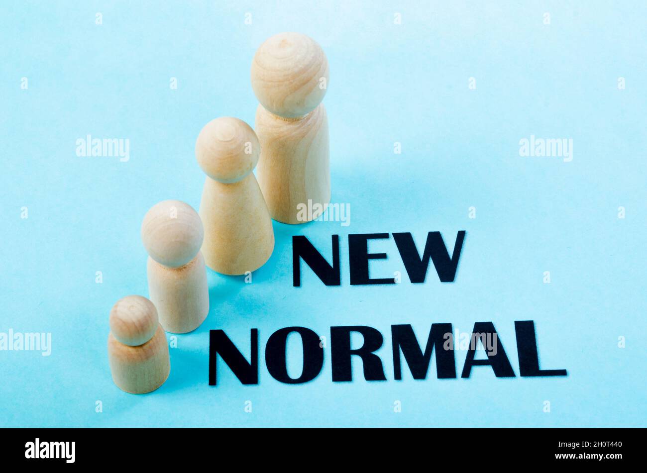 Person wooden doll standing with New normal. Life after pandemic ...