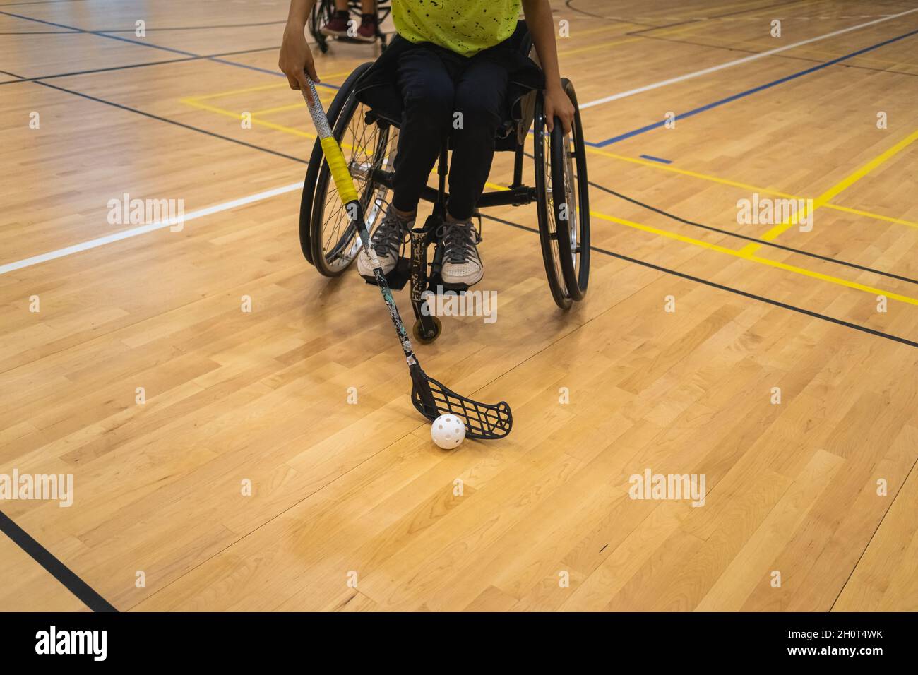 Athlete with disability playing wheelchair hockey with stick Stock ...