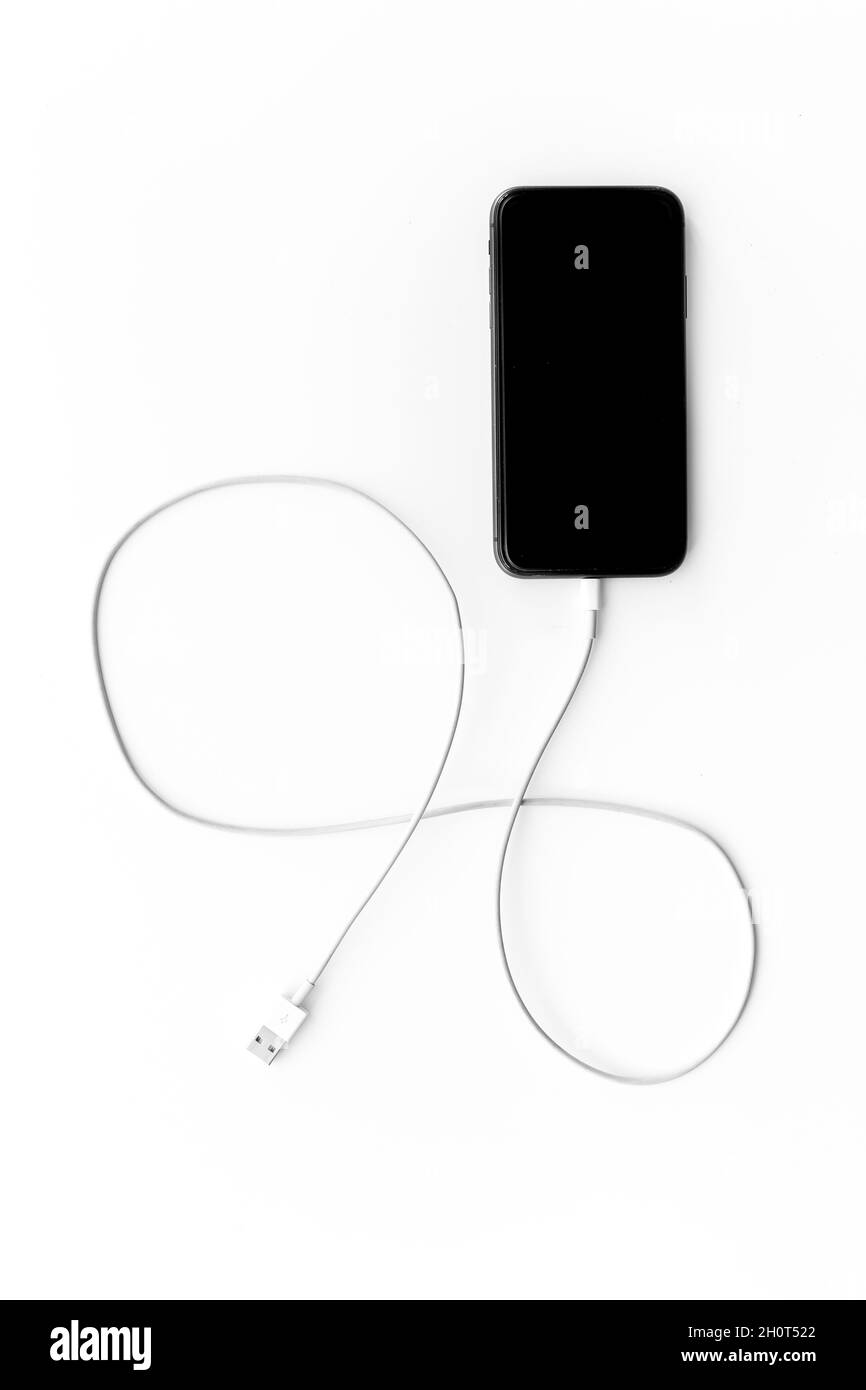 Cord charger with cable for mobile phone or laptop, top view Stock ...