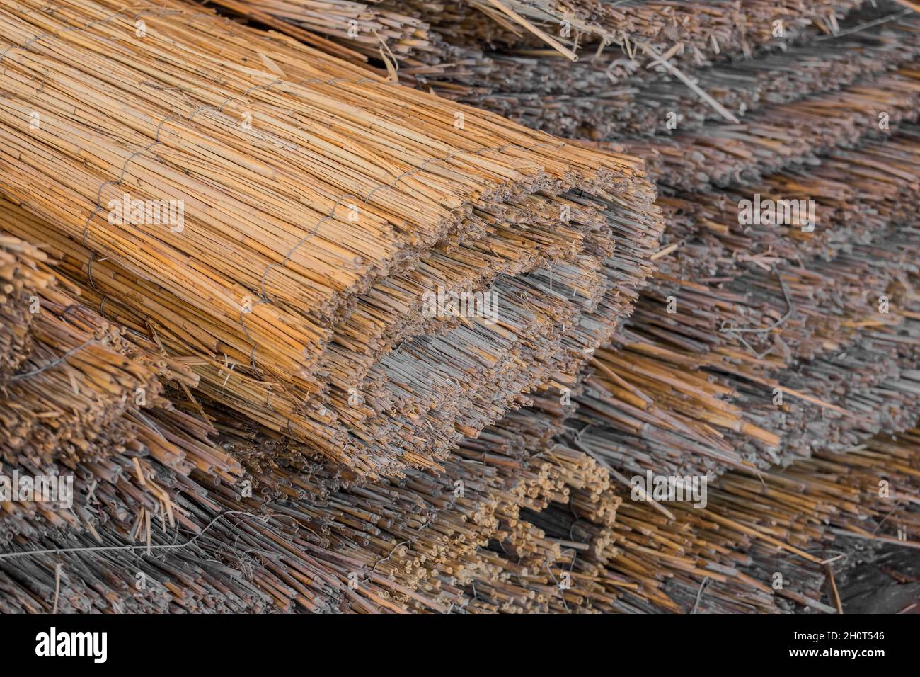 Straw rope dry reed natural material is stored in rolls Stock Photo - Alamy