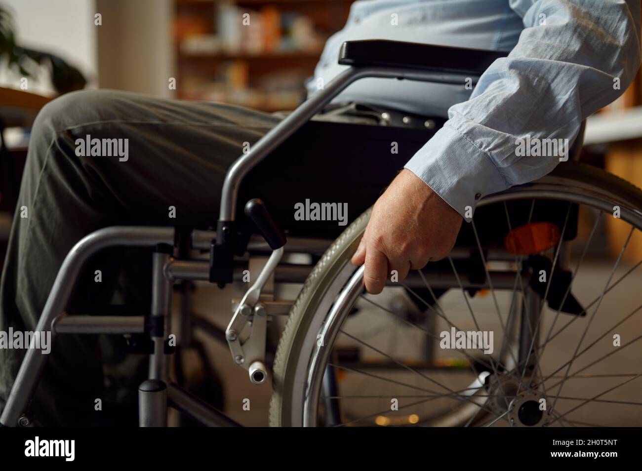 Adult disabled man in wheelchair, disability Stock Photo - Alamy