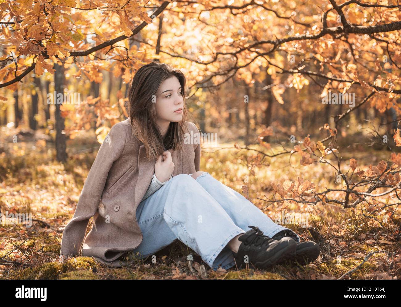 Portrait of a thoughtful and sad girl. Autumn colors . Lifestyle ...