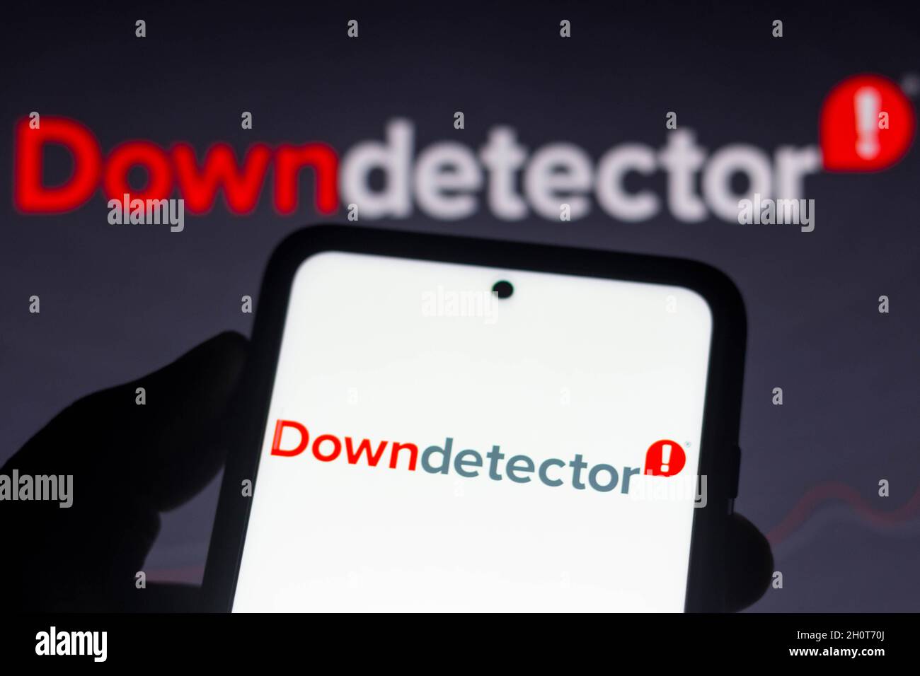 In this photo illustration, Downdetector logo seen displayed on a ...