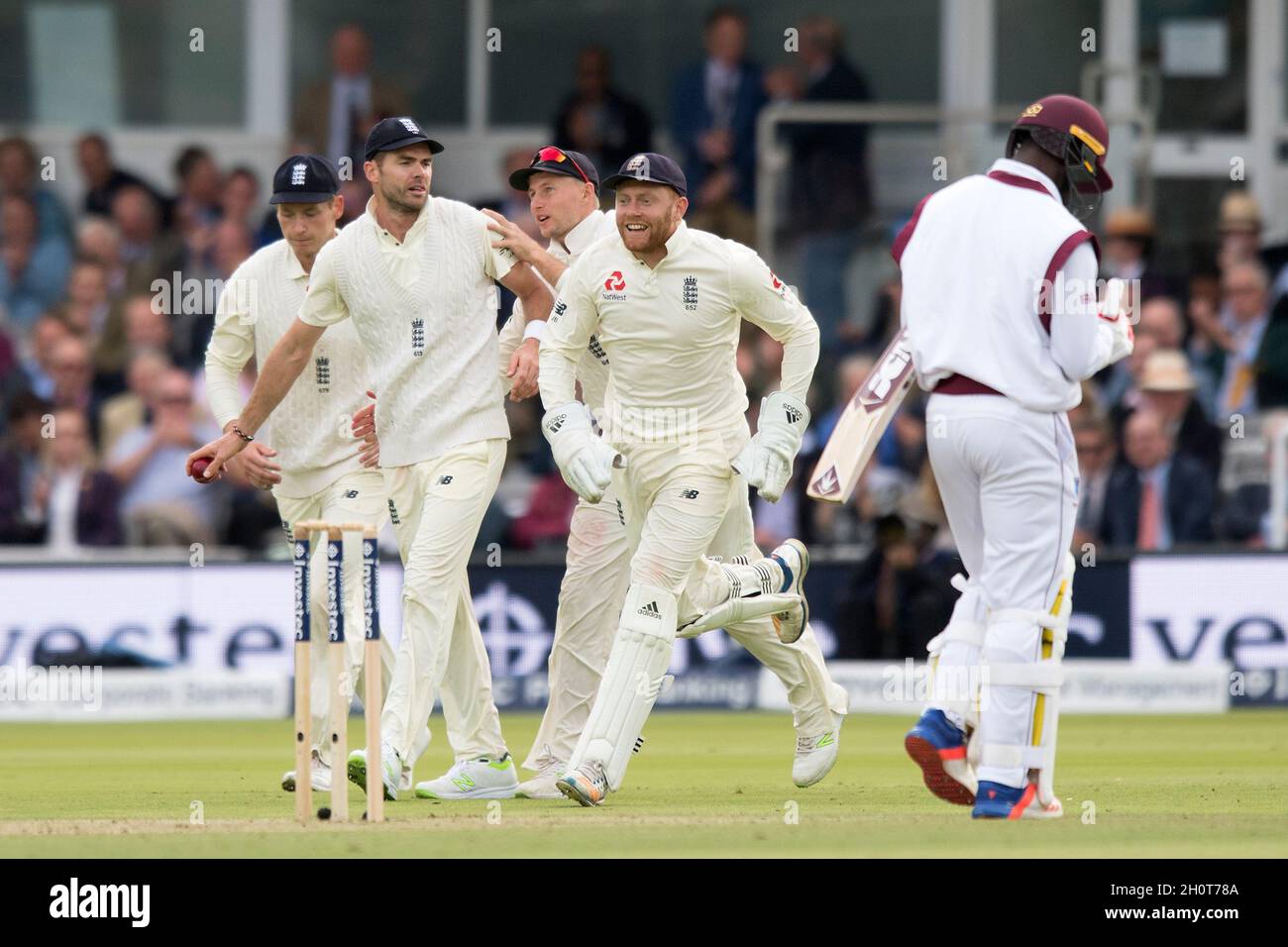 England celebrates after James Anderson caught West Indies' Kemar Roach ...