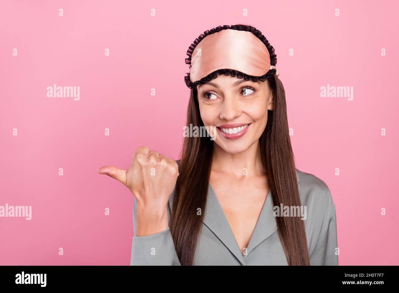 Portrait of attractive trendy cheerful woman demonstrating copy blank ...