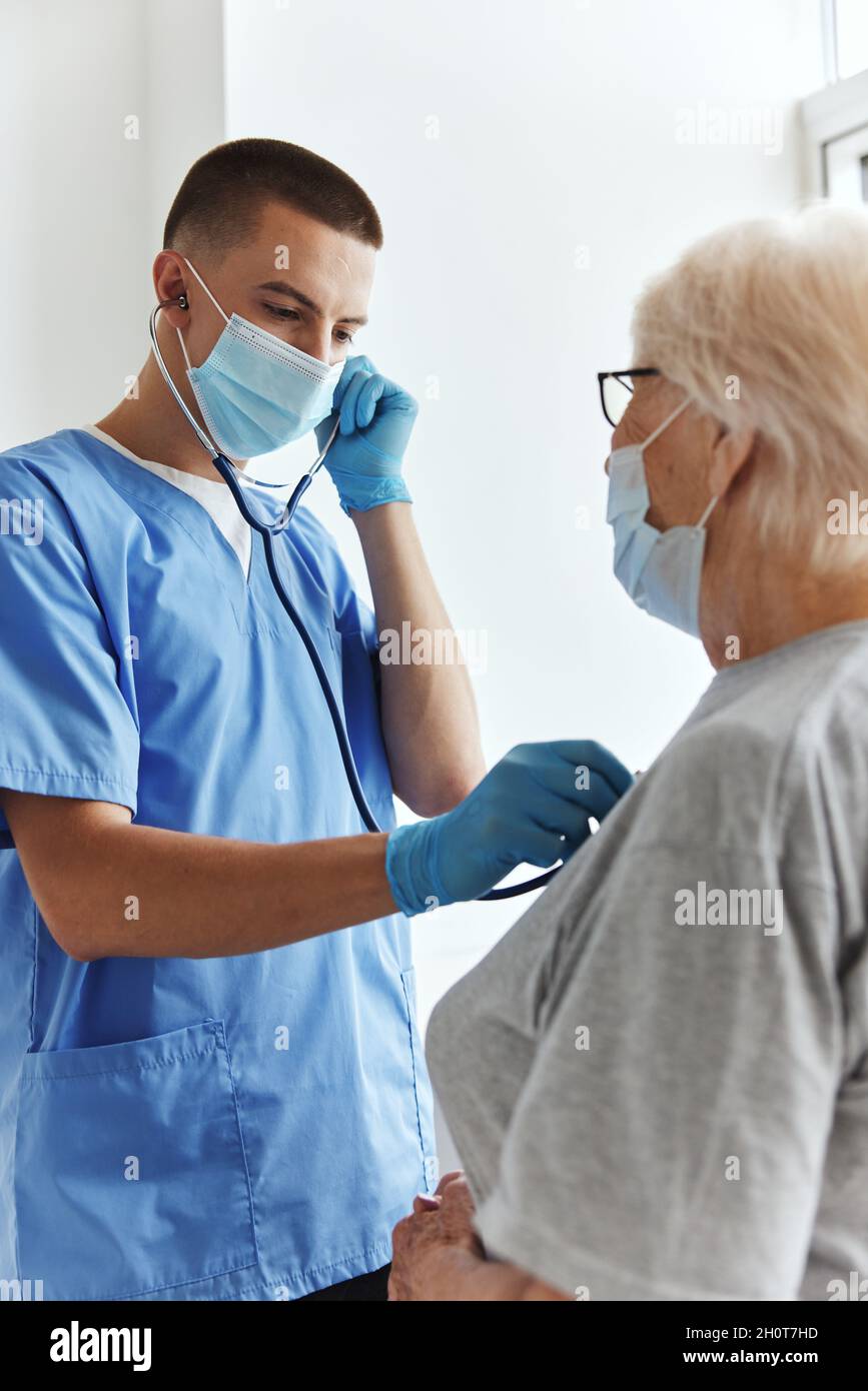 doctor in hospital examine a patient treatment Stock Photo - Alamy