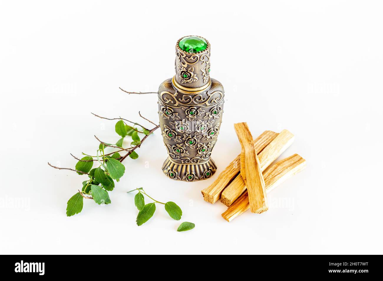 Agar wood oil fragrances or arabian oud perfume with sticks of tree ...