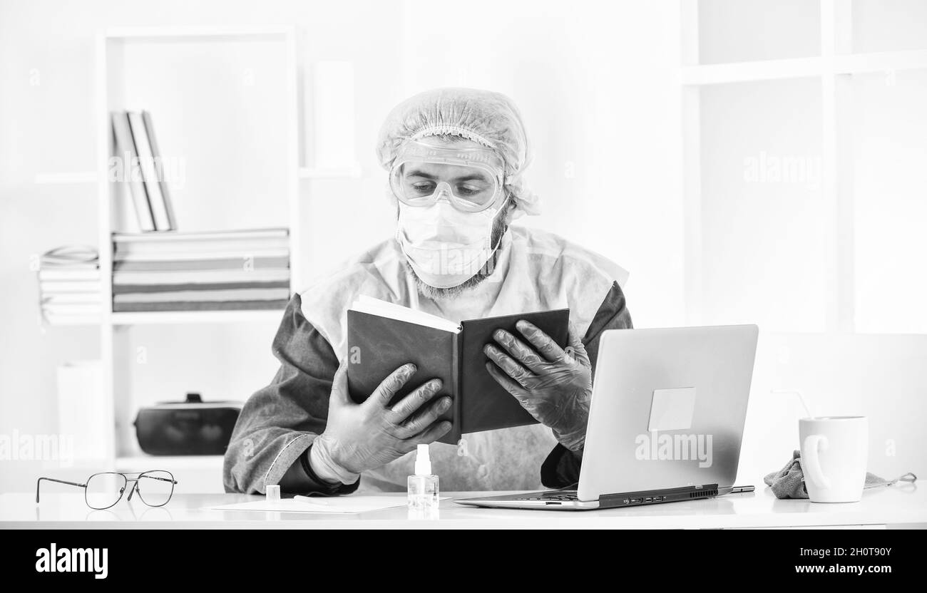 coronavirus epidemic. social distancing. remote work with hand ...