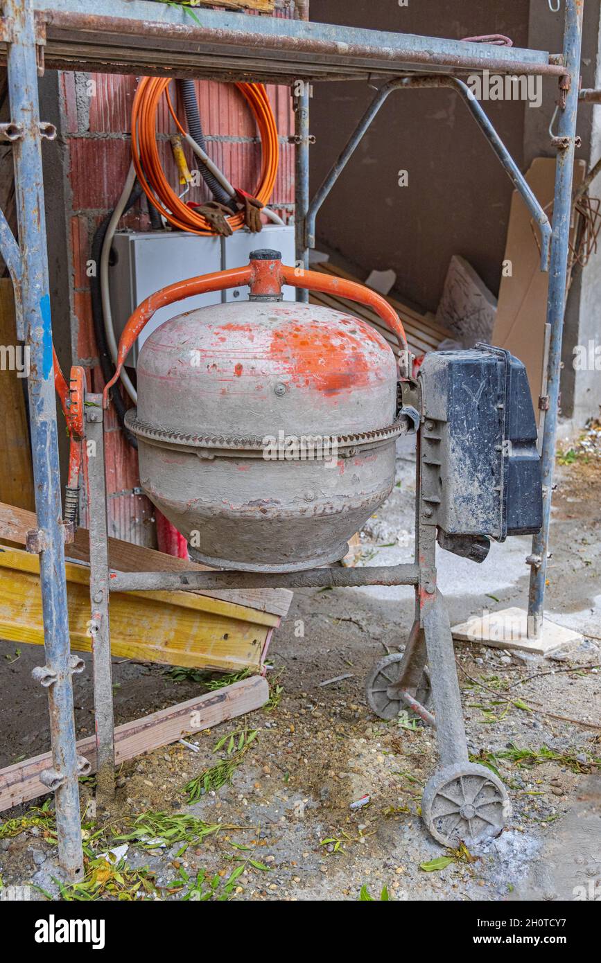Concrete Cement Mixer Machine at Construction Site Stock Photo - Alamy