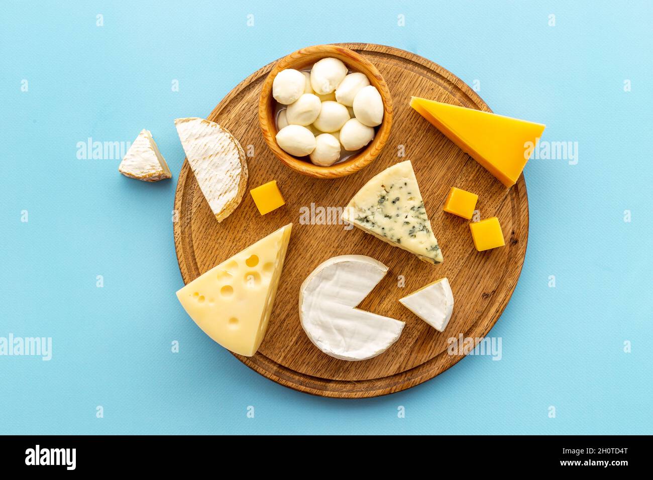 Various types of cheese layout. Dairy products flat lay Stock Photo - Alamy
