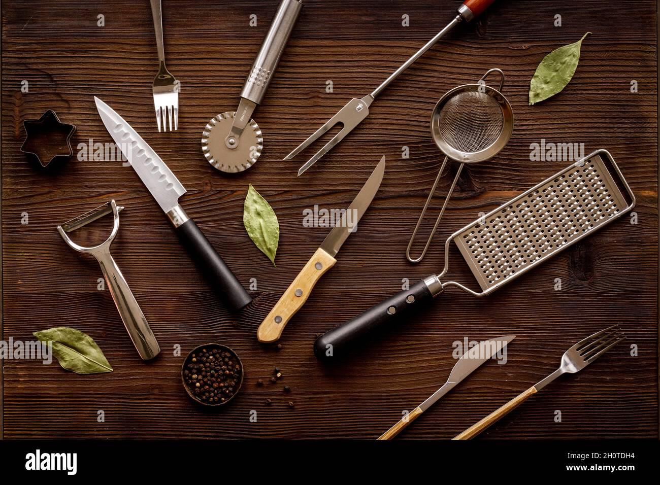 Cooking background with metal kitchen utensils and cookware Stock Photo ...