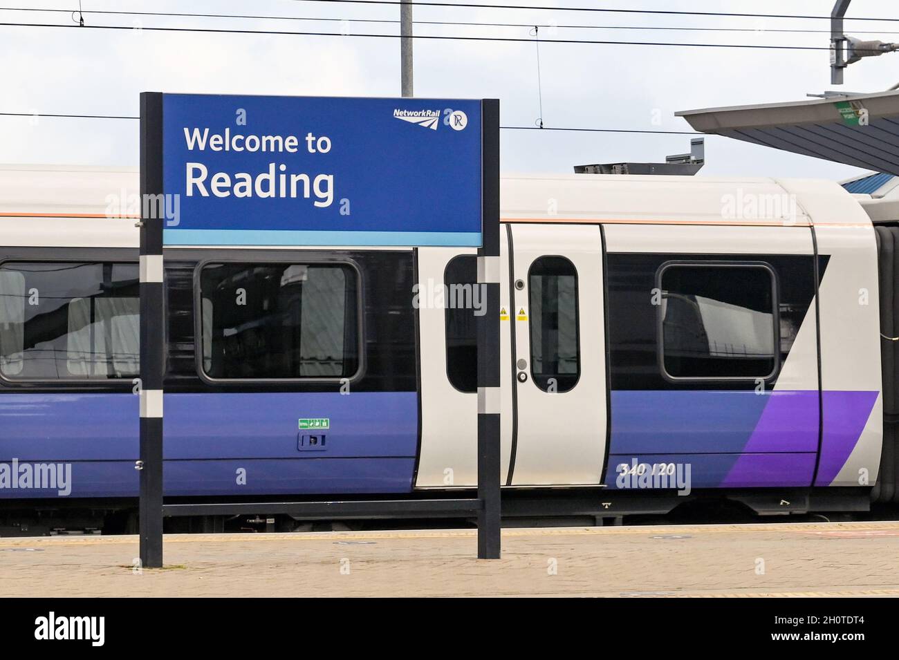 Reading, England - August 2021: Station sign on one of the platforms at ...