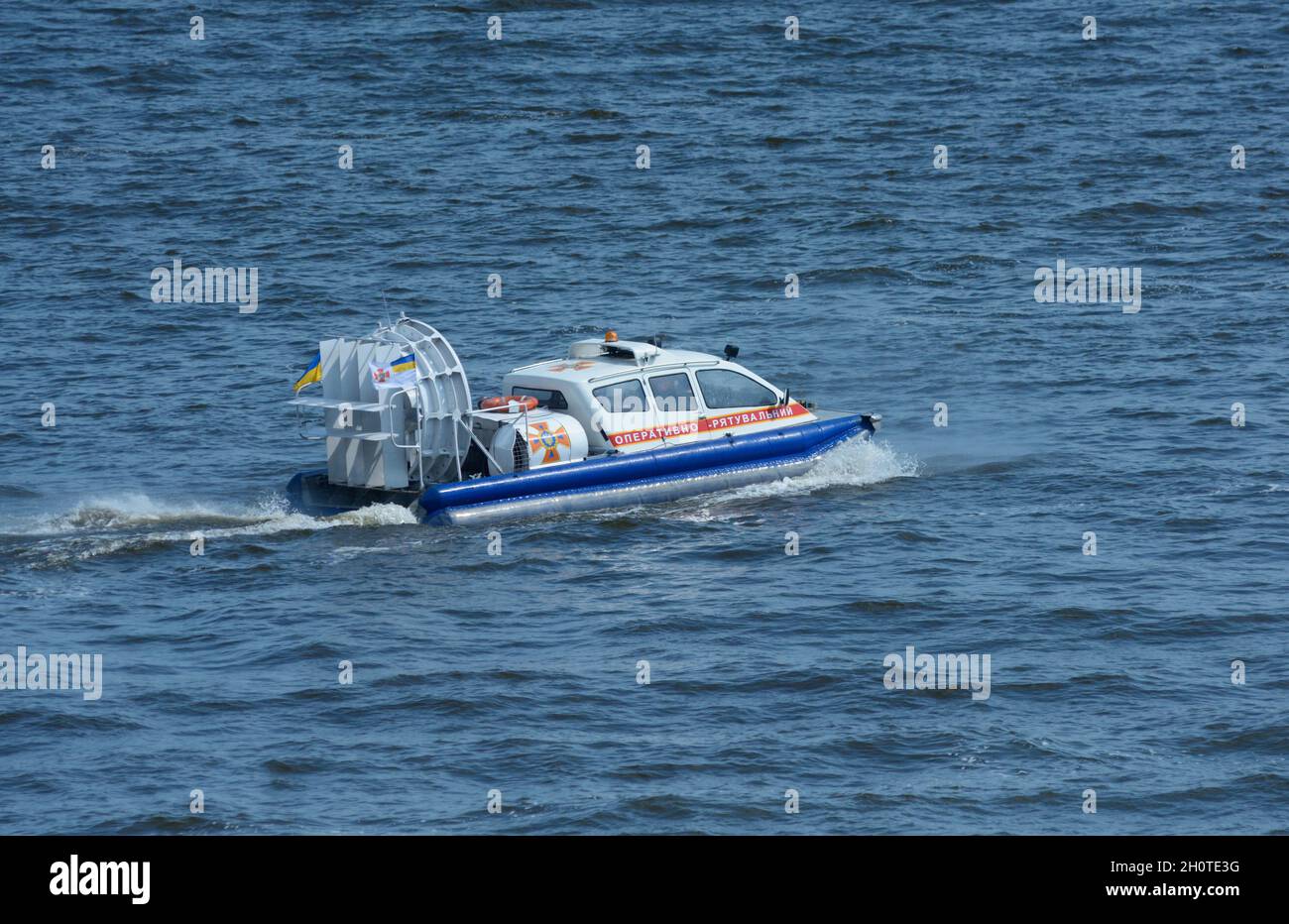 Military rescue boat floating on water Stock Photo - Alamy